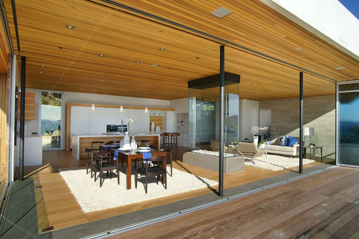 Retractable glass walls create exemplary indoor/outdoor living in Tiburon
