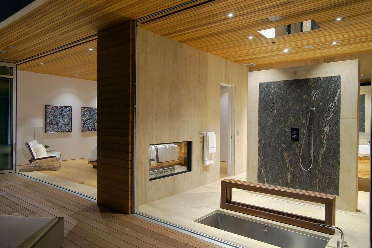 Retractable glass walls create exemplary indoor/outdoor living in Tiburon