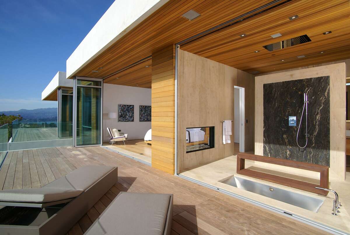 Retractable glass walls create exemplary indoor/outdoor living in Tiburon