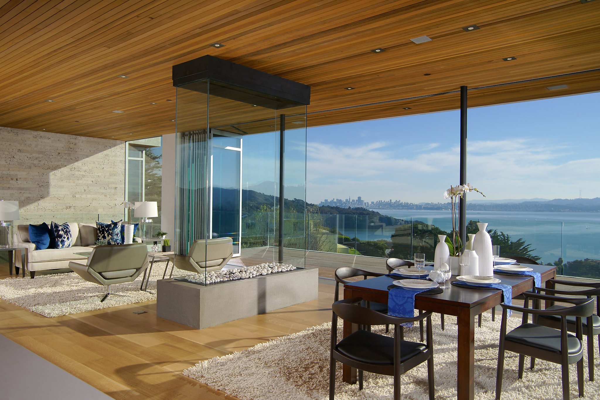 Retractable glass walls create exemplary indoor/outdoor living in Tiburon