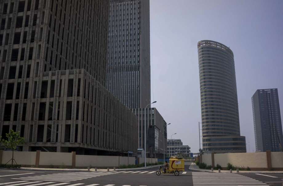 An eerie look inside China's enormous, empty 'ghost cities' - Houston ...