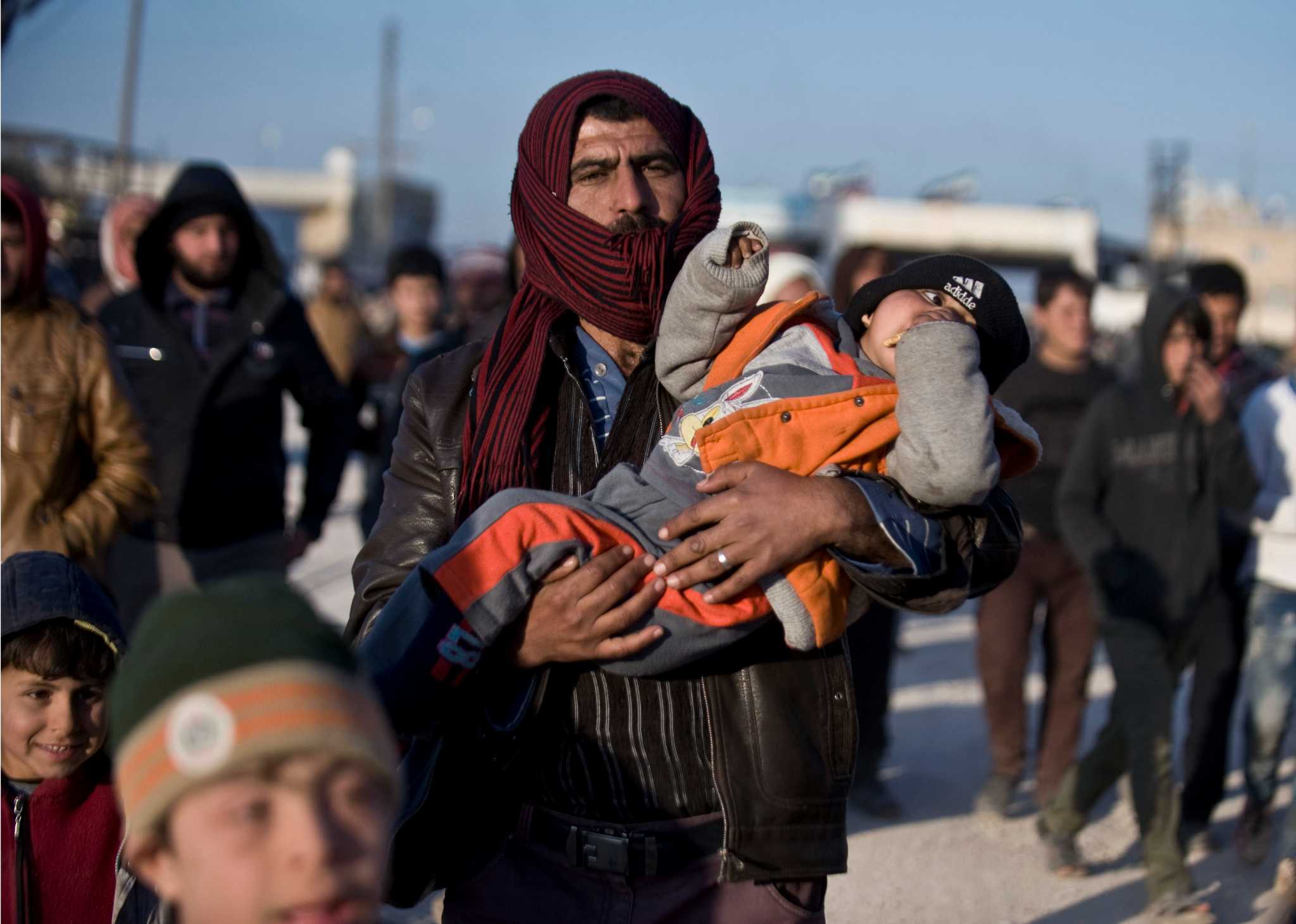 Fighting prompts thousands to flee