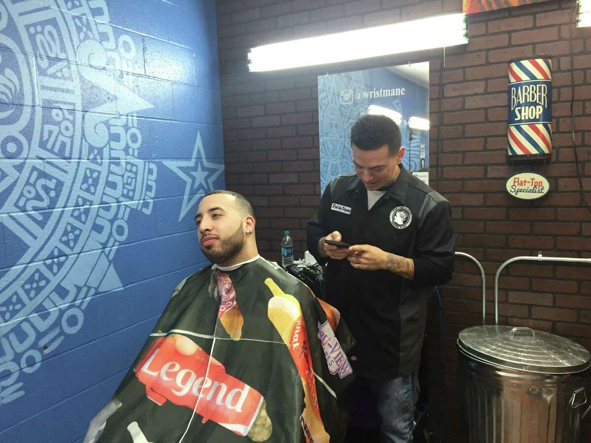 Barber does cutting-edge work on Spurs haircuts