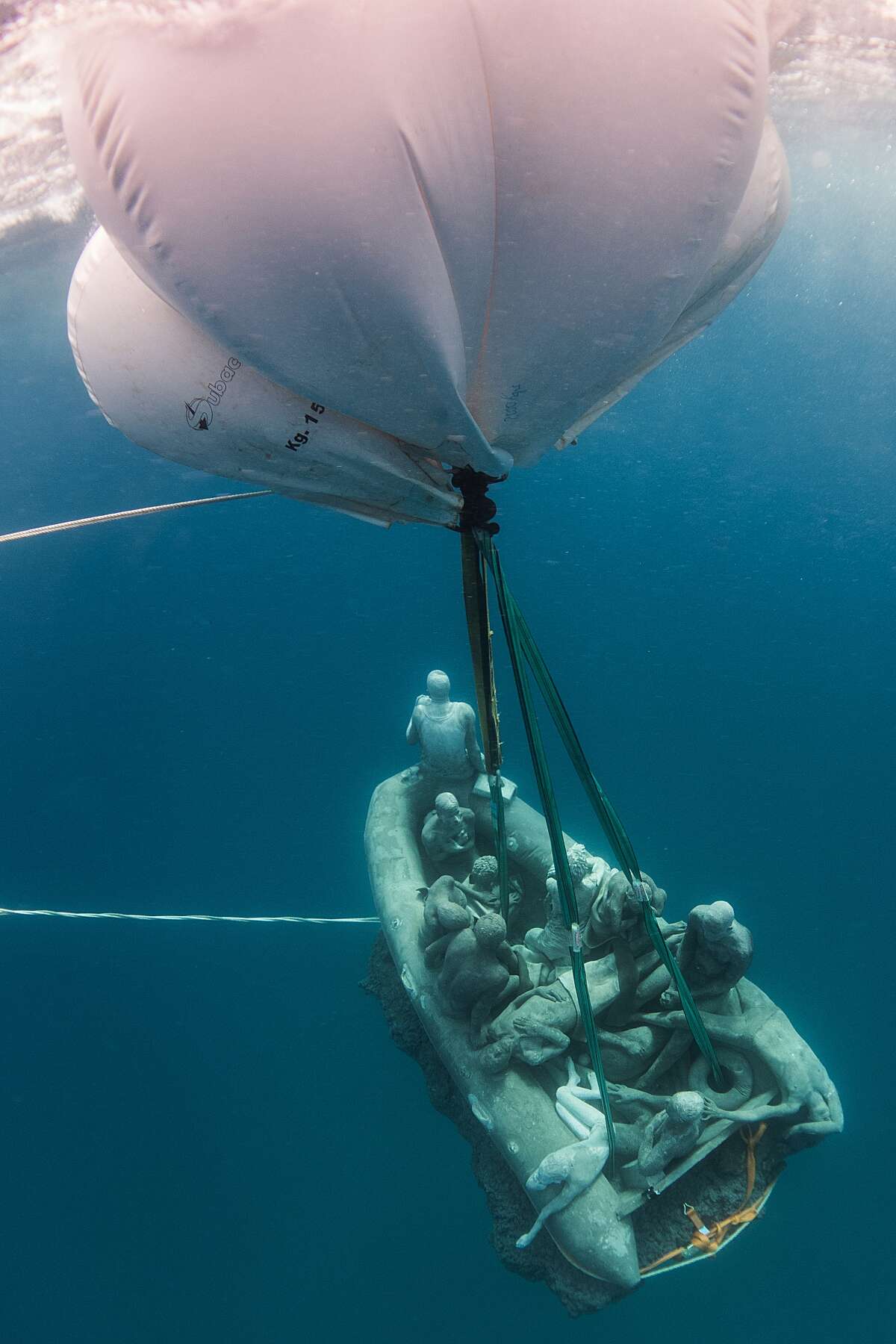400 human sculptures create a haunting underwater museum