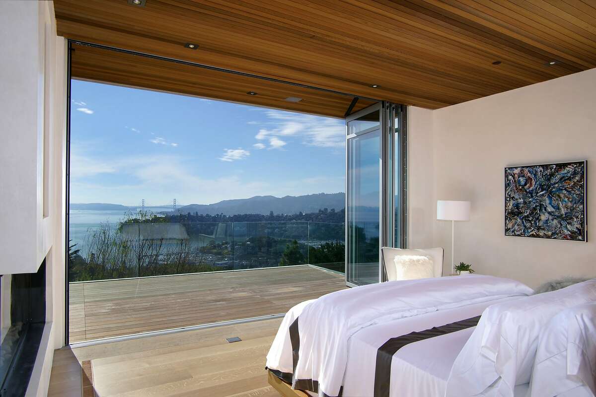 Retractable glass walls create exemplary indoor/outdoor living in Tiburon