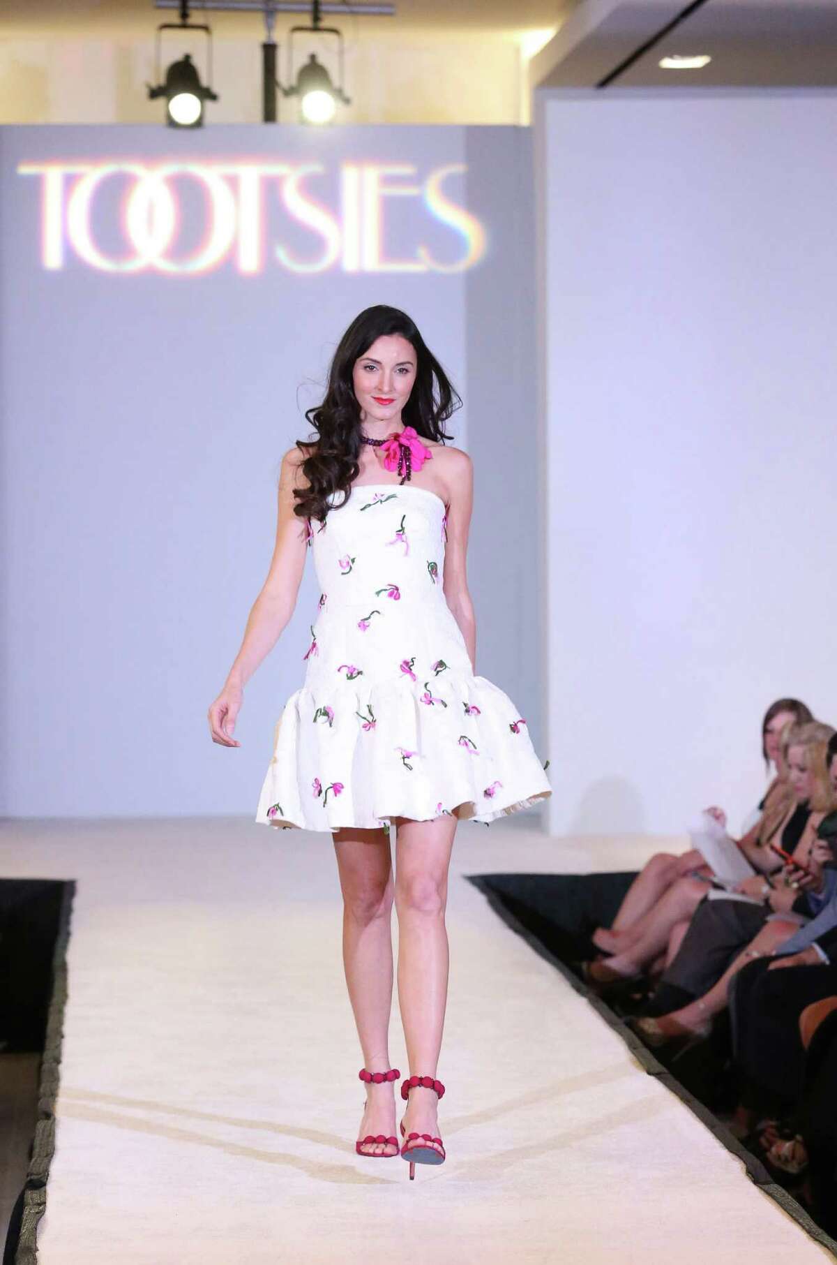 Houston Texans, Chita Johnson and local celebs hit the runway