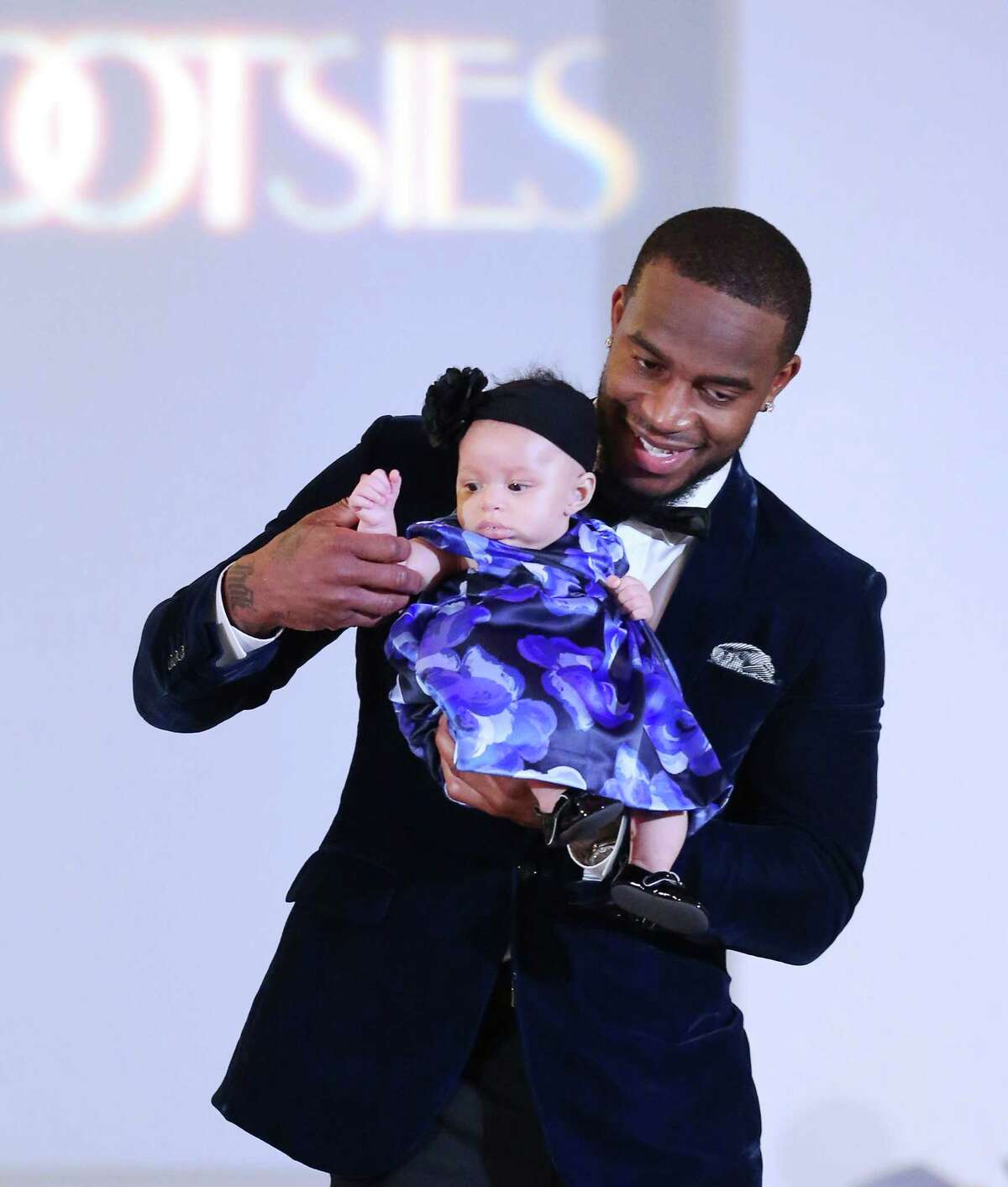 Houston Texans, Chita Johnson and local celebs hit the runway