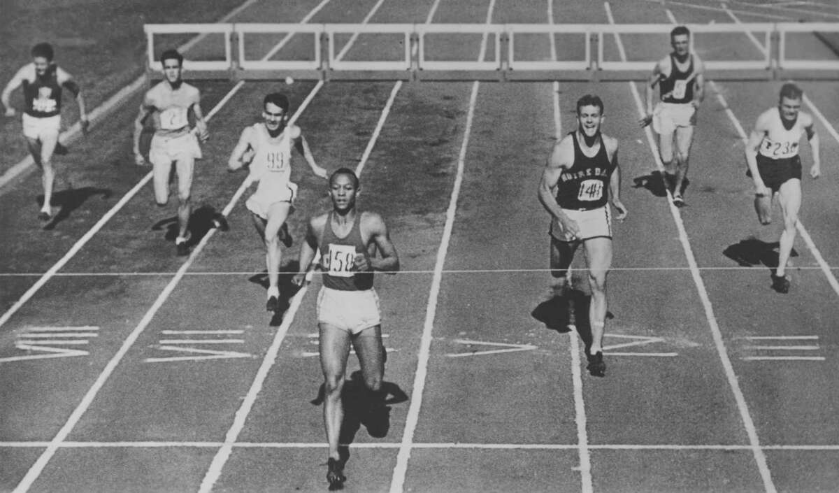 Historic photos show Jesse Owens smashing world records at Hitler's ...