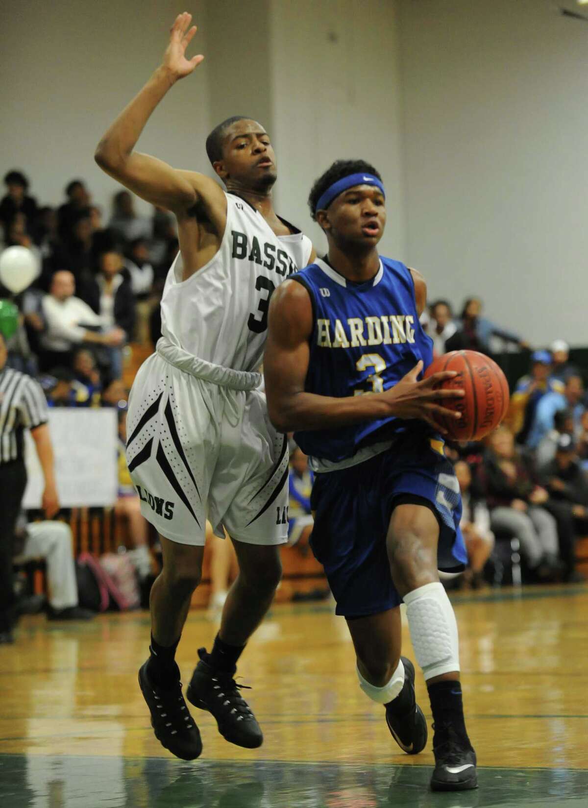 Bassick outlasts Harding in scoring marathon