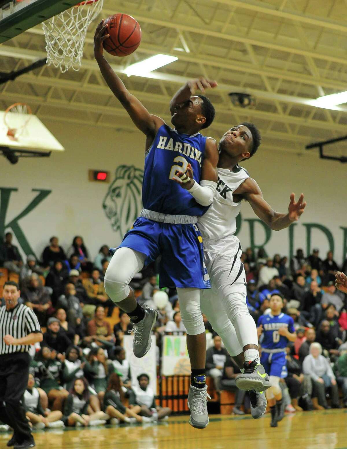 Bassick outlasts Harding in scoring marathon