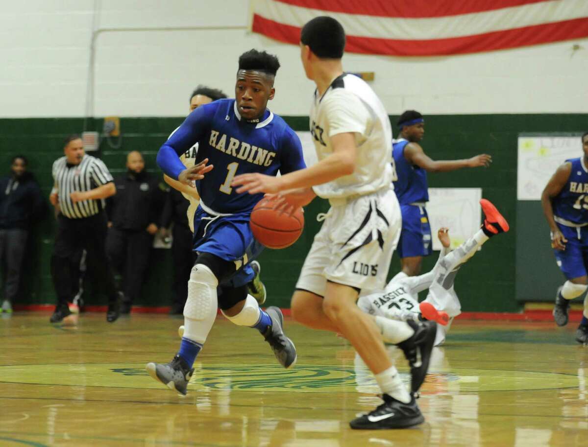 Bassick outlasts Harding in scoring marathon