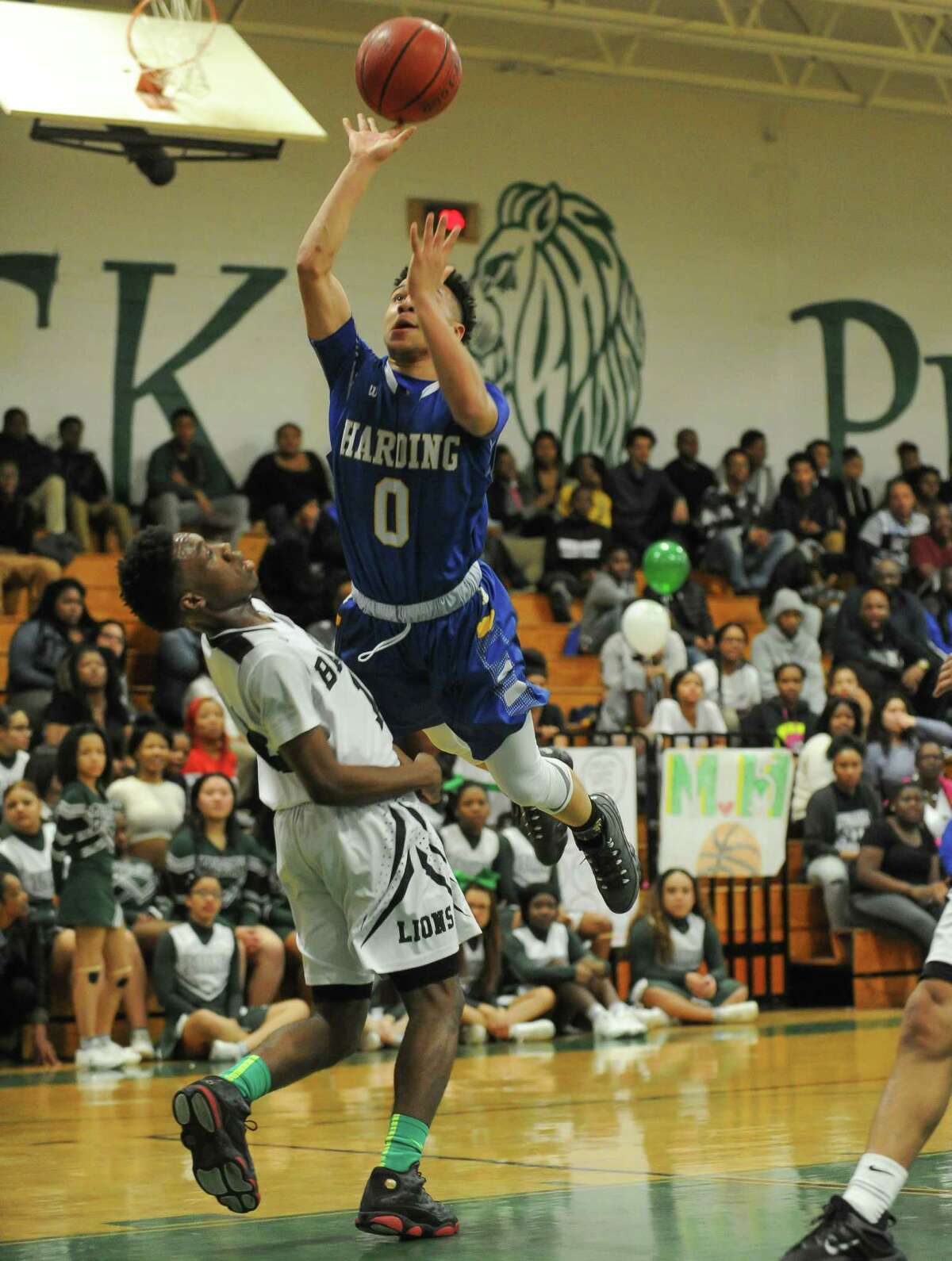 Bassick outlasts Harding in scoring marathon