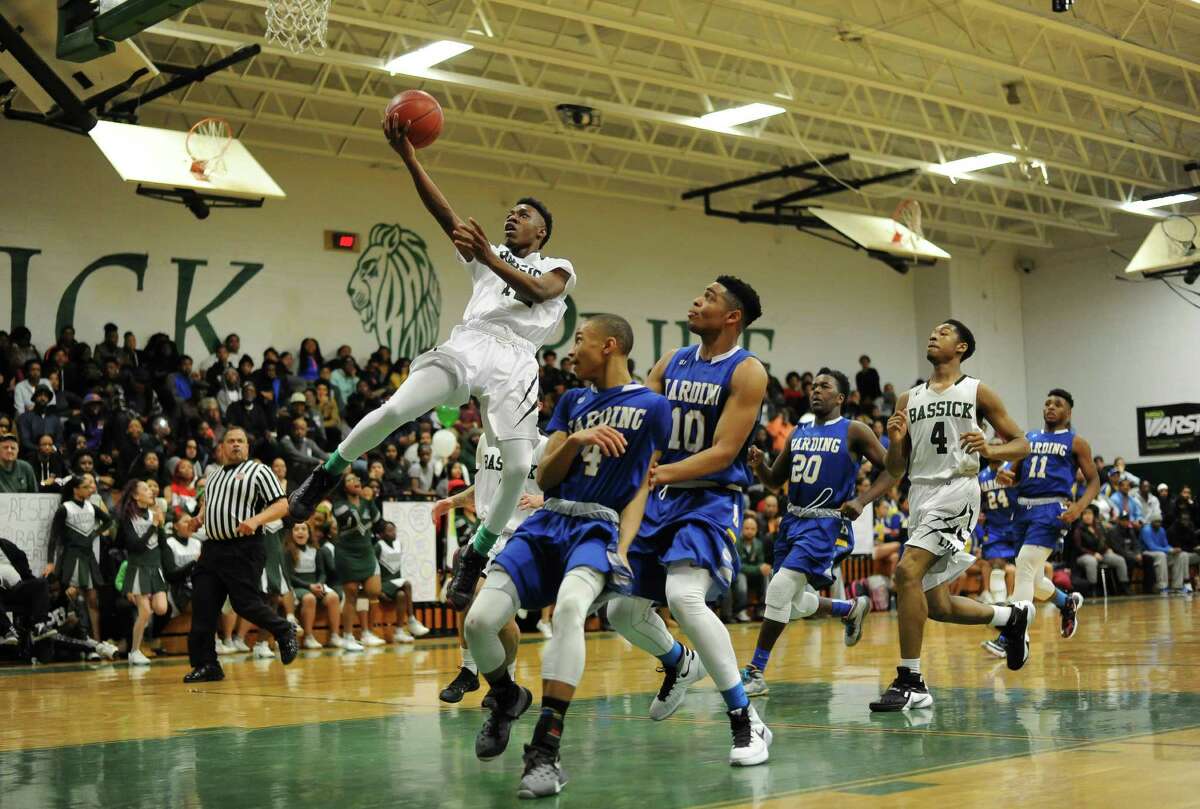 Bassick outlasts Harding in scoring marathon