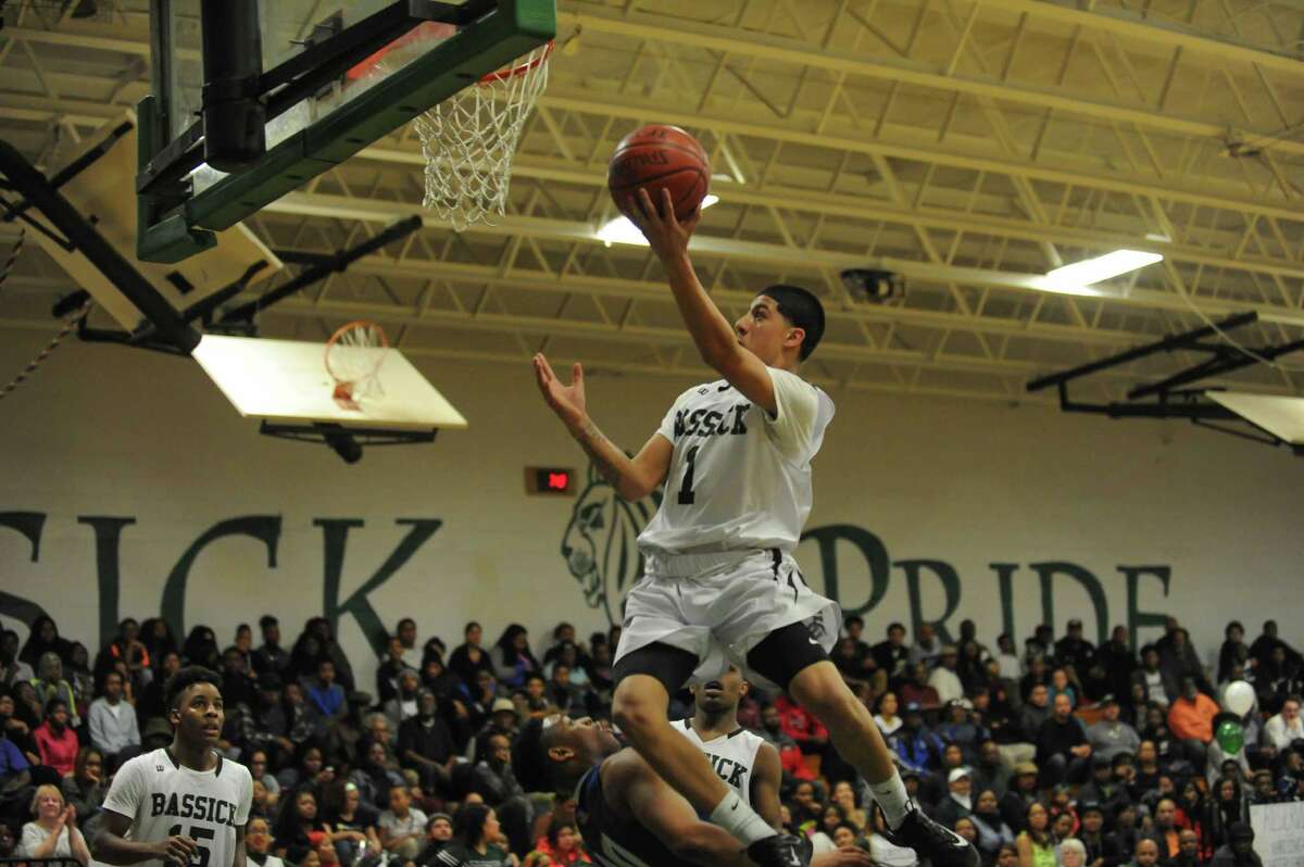 Bassick outlasts Harding in scoring marathon
