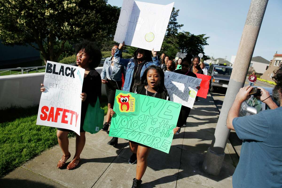 Lowell High students walk out to protest sign seen as racist