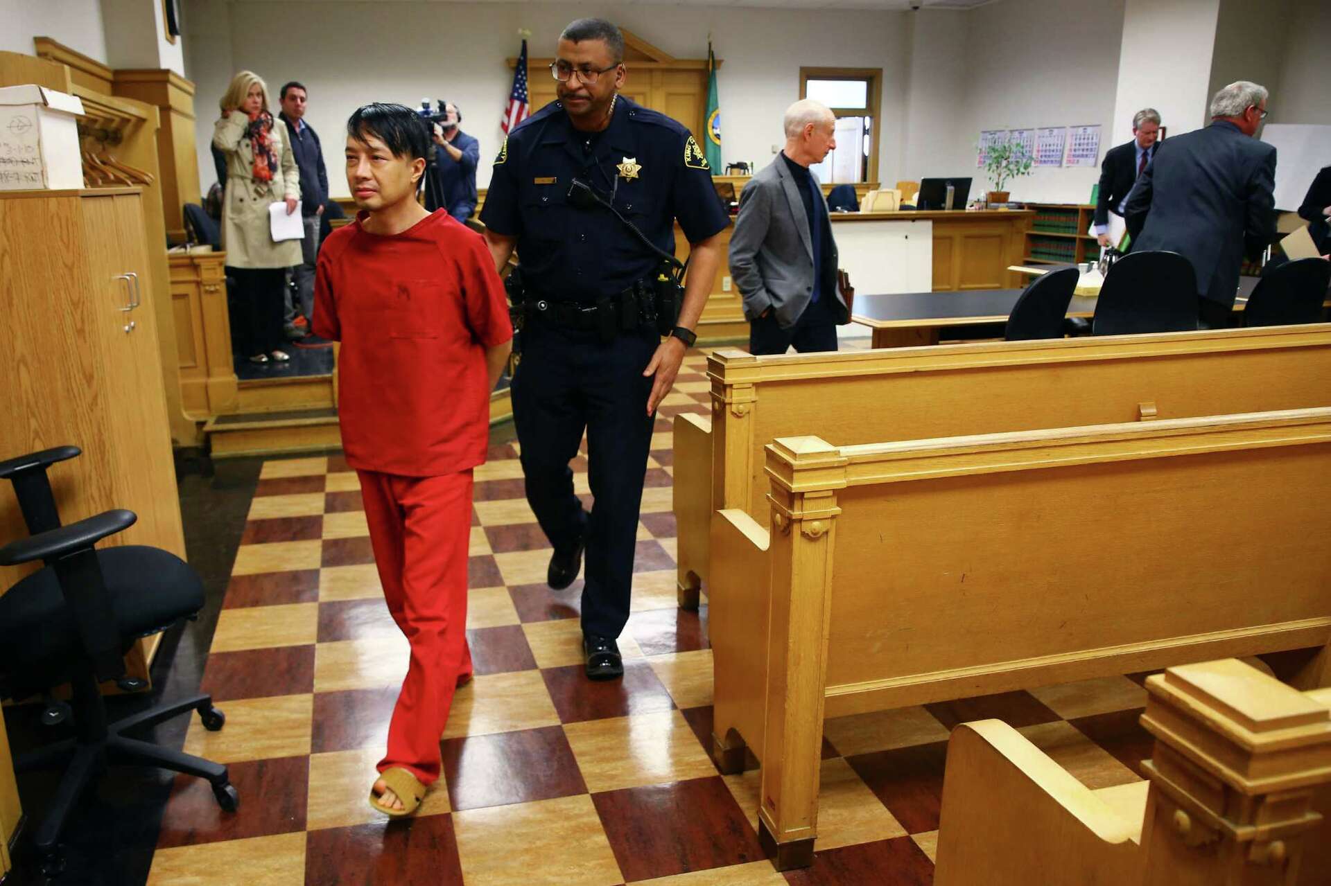 Seattle doctor admits to killing son, partner