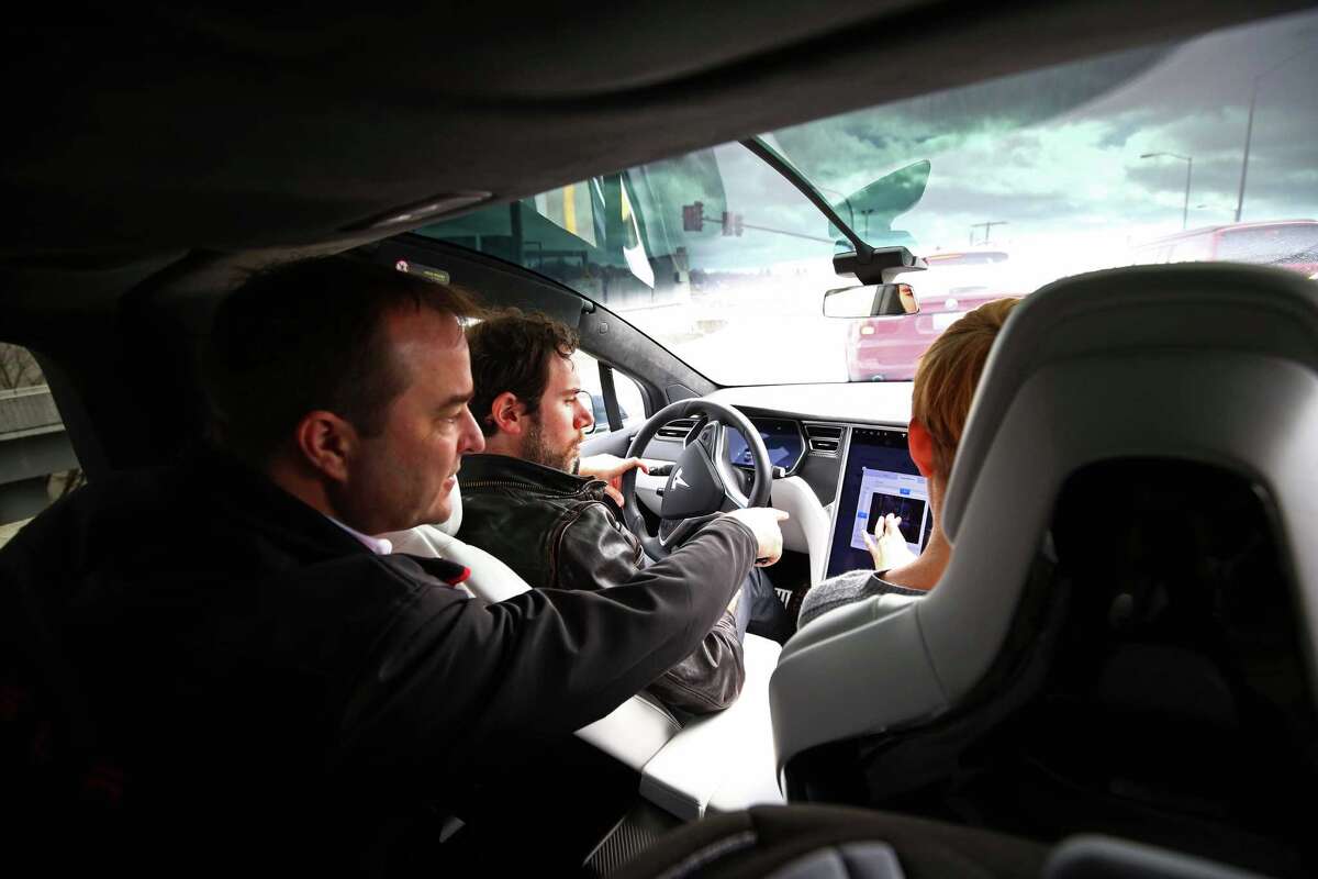 Tesla shows off its Model X to Seattle customers