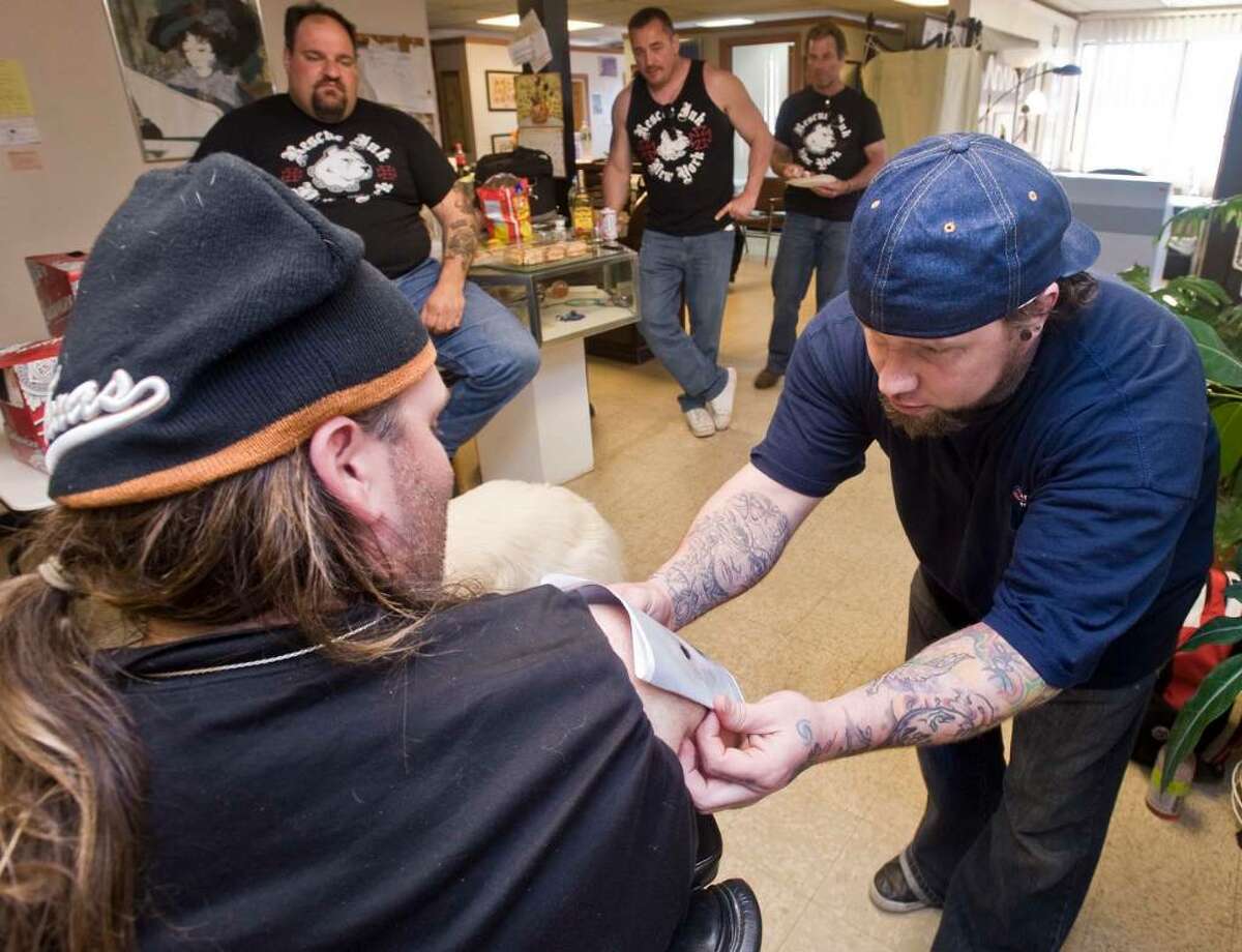 Rescue Ink motorcycle advocates visit Danbury shop