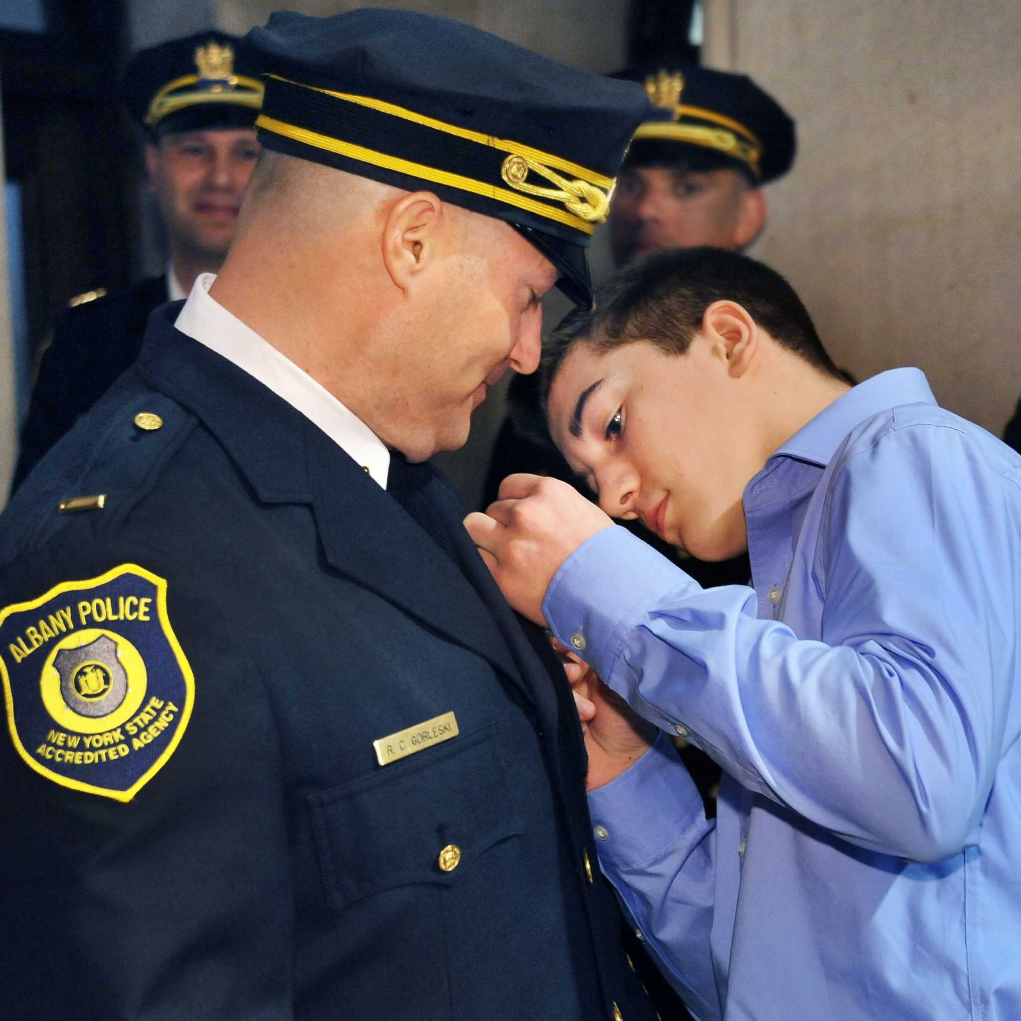 Albany police department promotes seven officers