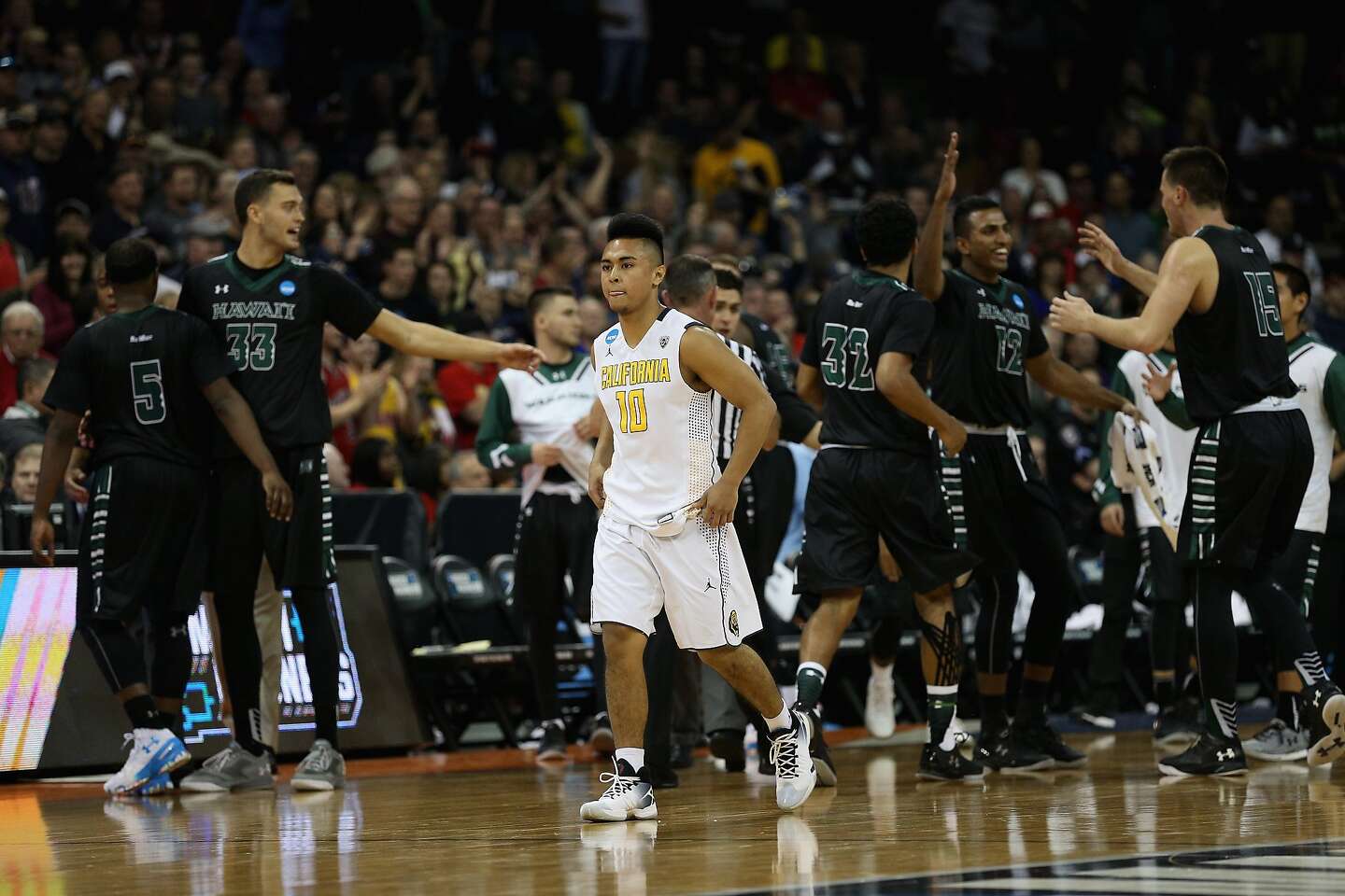 Cal ends tumultuous week with 1st-round loss to Hawaii