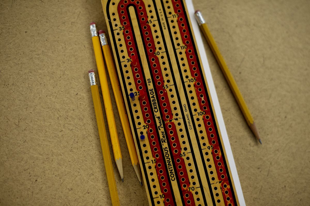 Eric McPeak, Bruce Harris, and Pat Emerson earn top cribbage scores