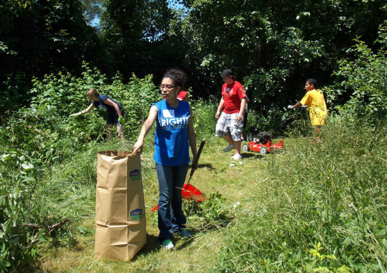 Local volunteers help transform one street in Saginaw