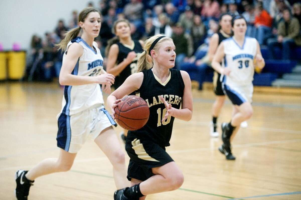 Bullock Creek Lancers girls basketball team rolls past Meridian Mustangs
