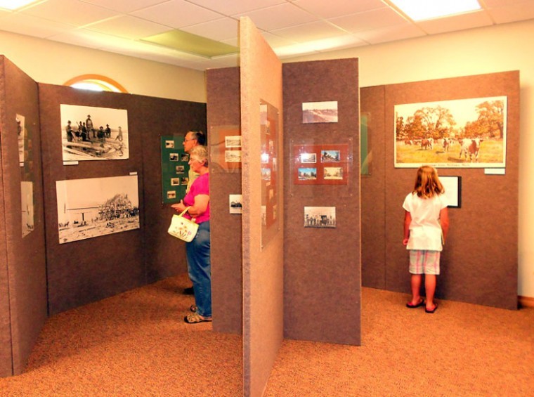 Historic local postcards on display at Coleman Area Library