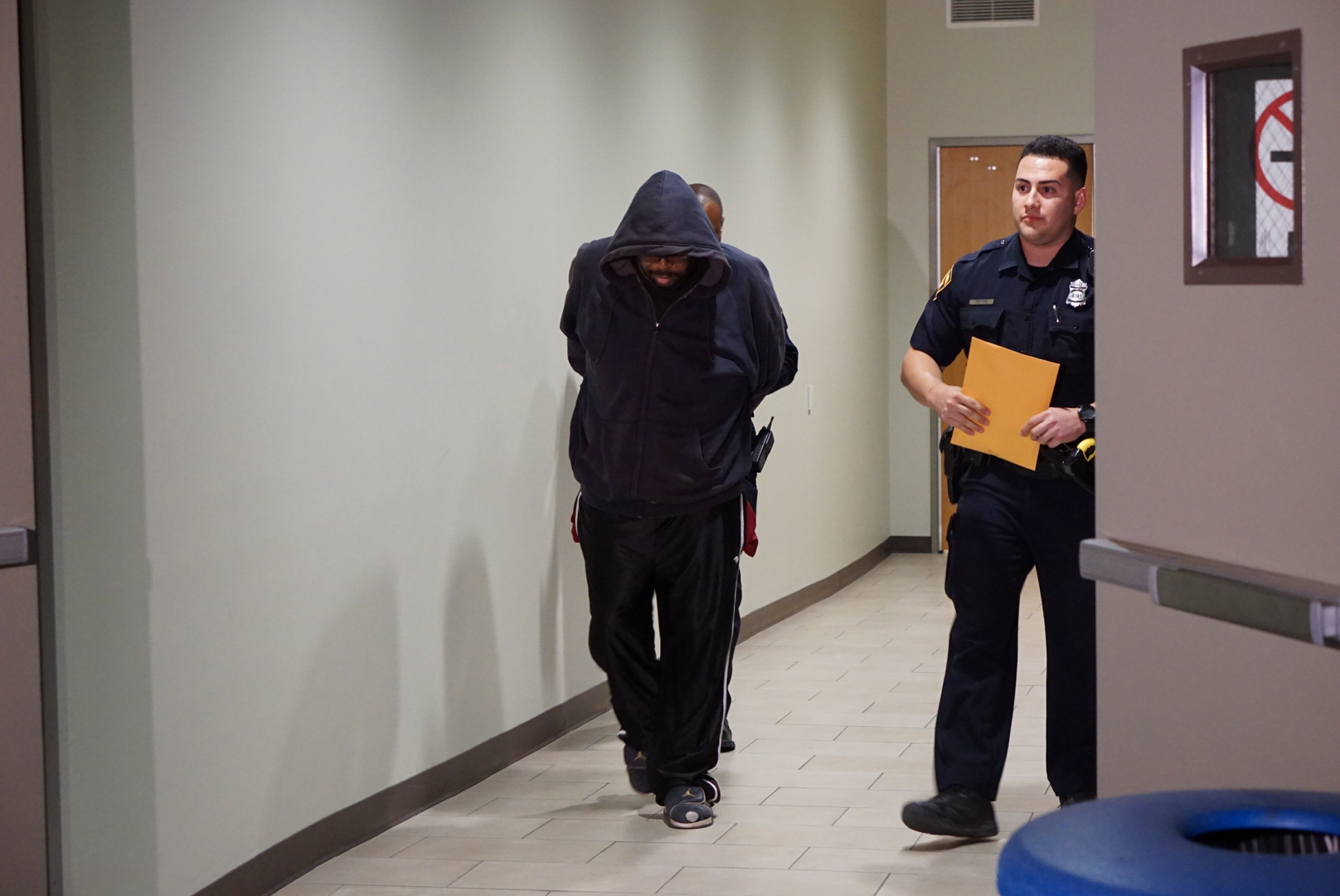 Man facing murder charge surrenders