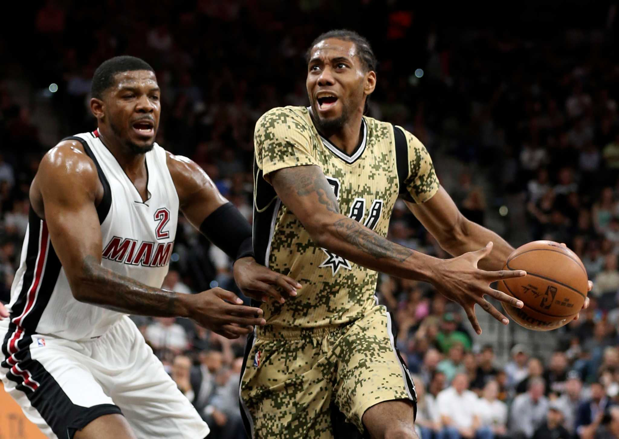 Leonard strong before early exit, Spurs roll