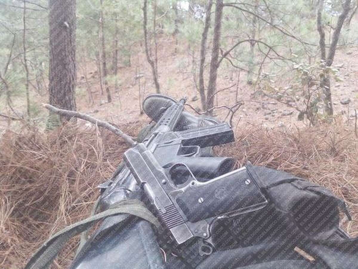 Masked assassins for the Juárez Cartel in Mexico shown holding guns in ...