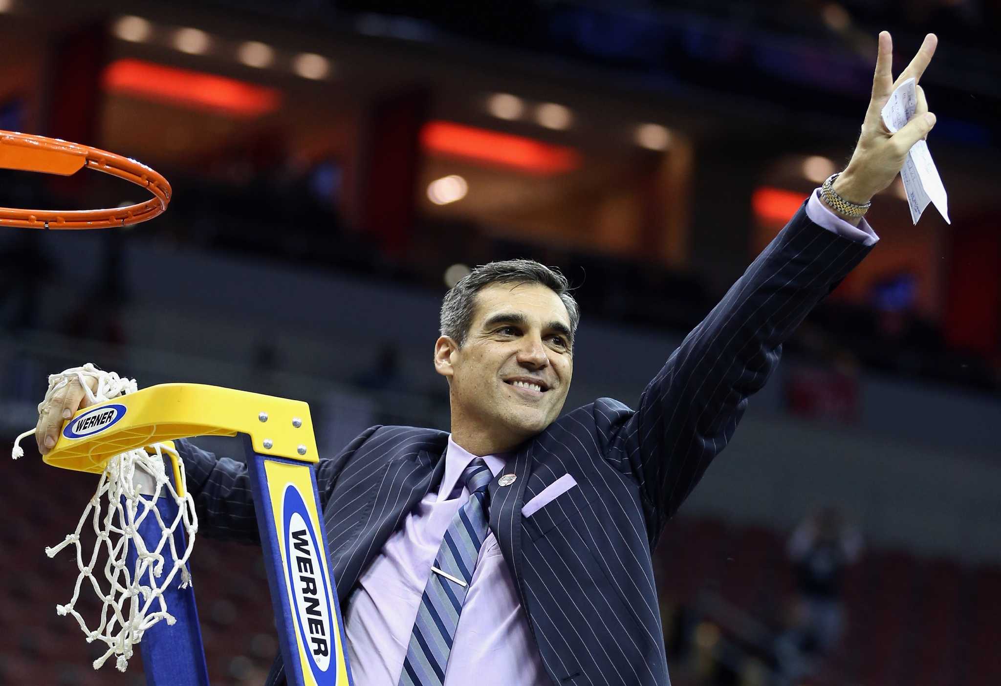 Victorious 'Nova players soak Jay Wright after stunning KU