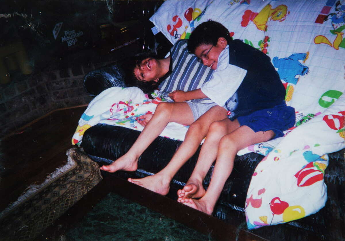 Survivor of childhood abuse moves forward by looking back