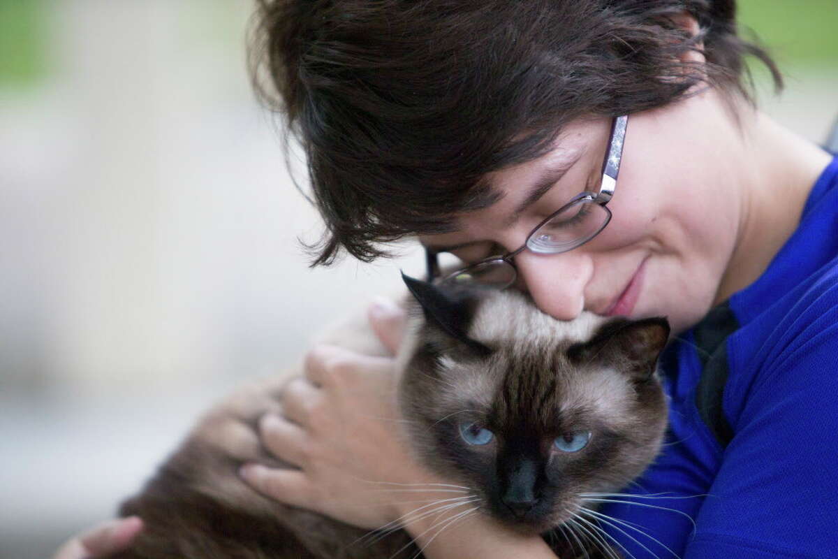 Survivor of childhood abuse moves forward by looking back