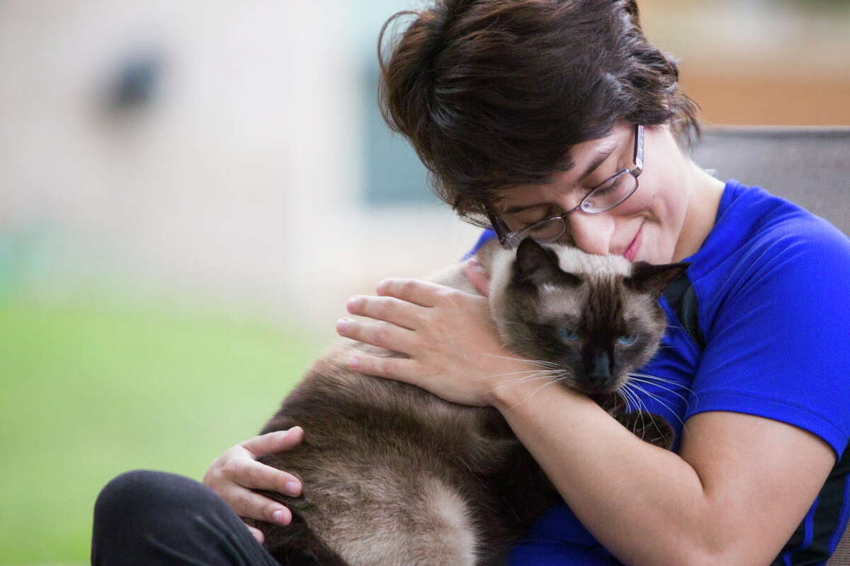 Survivor of childhood abuse moves forward by looking back