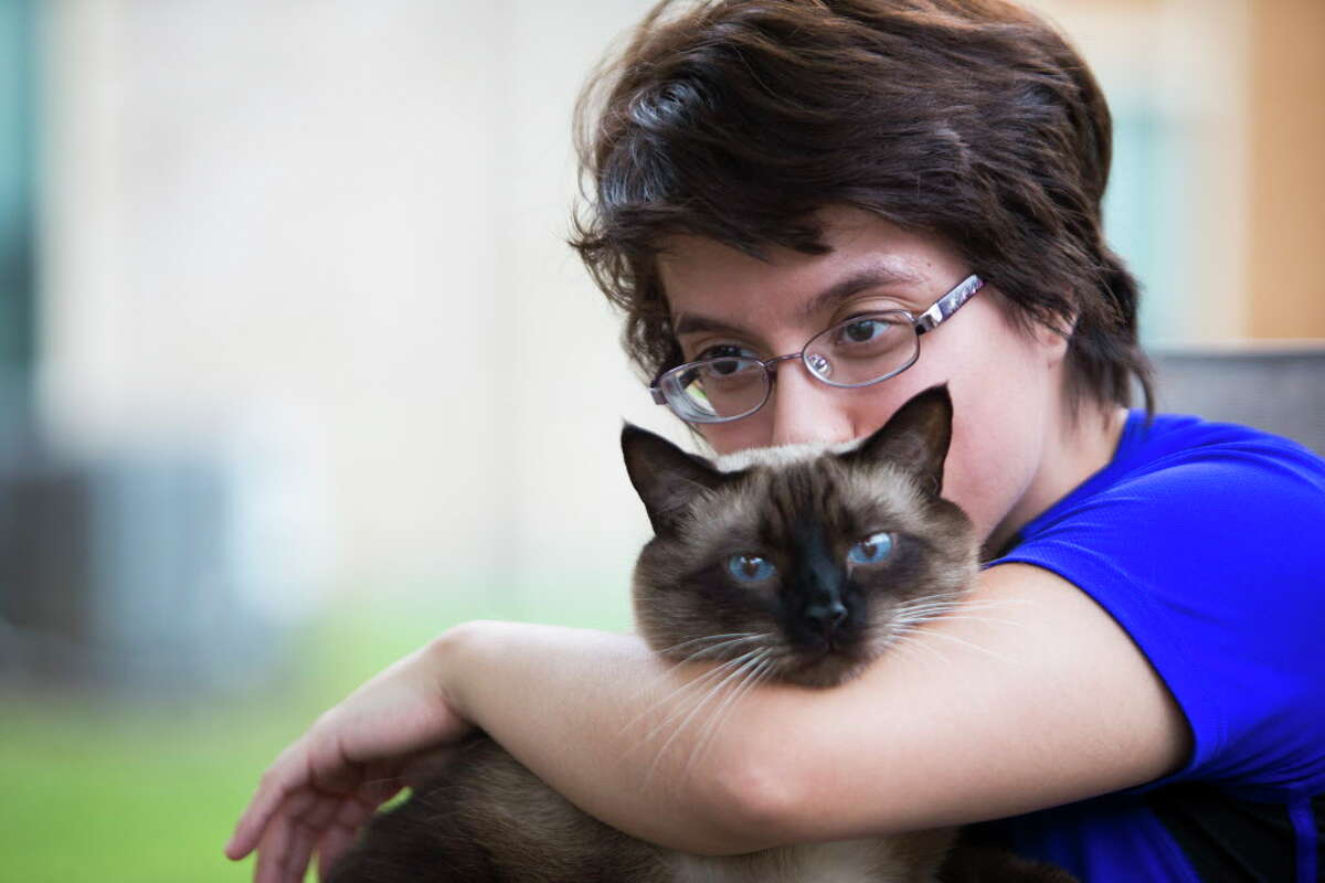 Survivor of childhood abuse moves forward by looking back