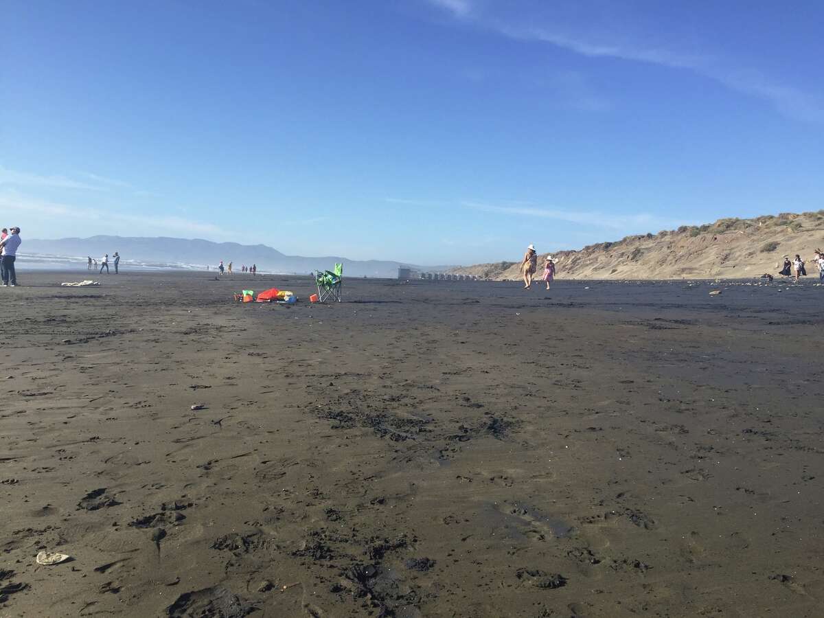 What's up with the black sand at Ocean Beach?