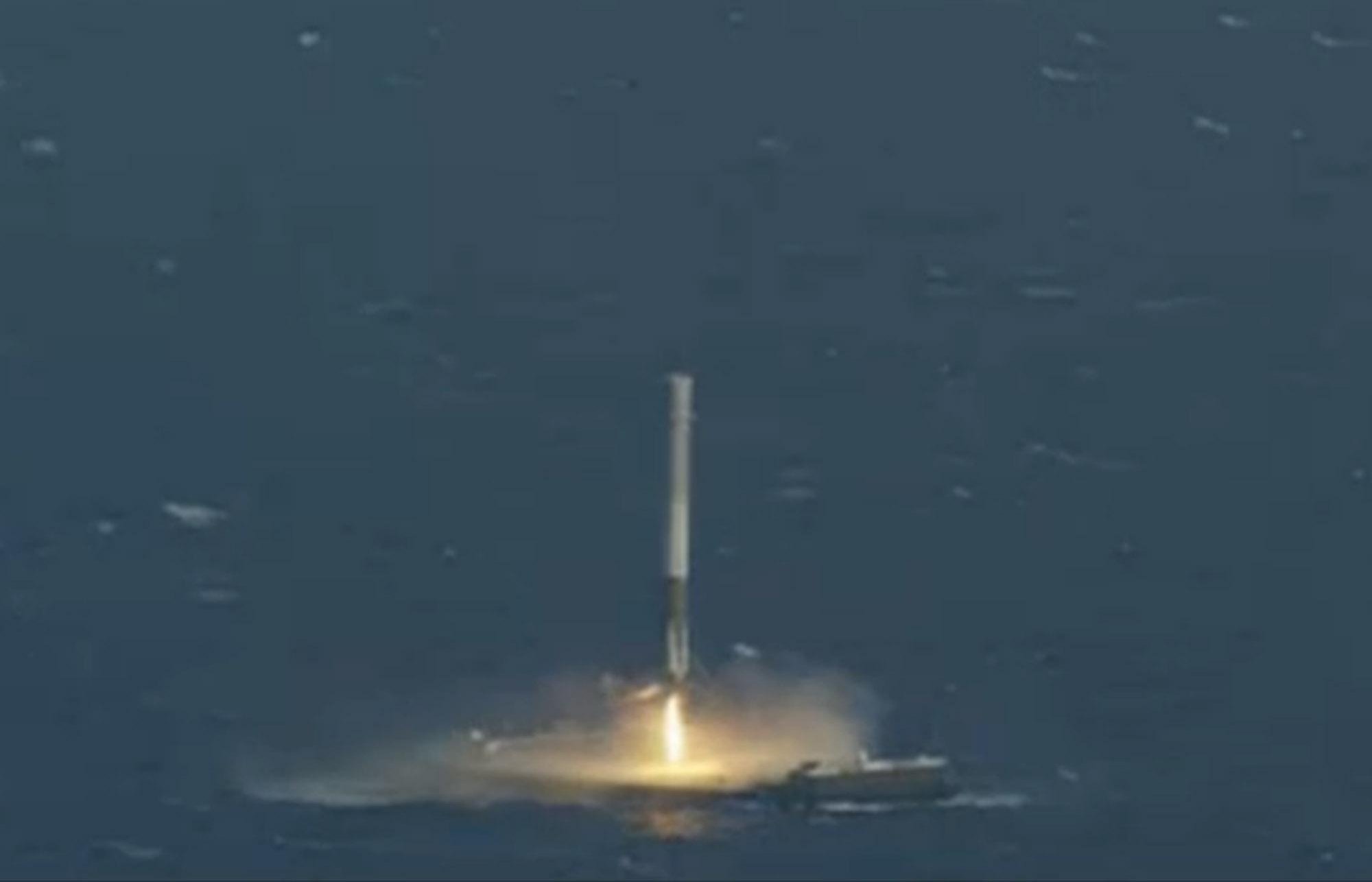 In a first, SpaceX lands booster rocket on barge