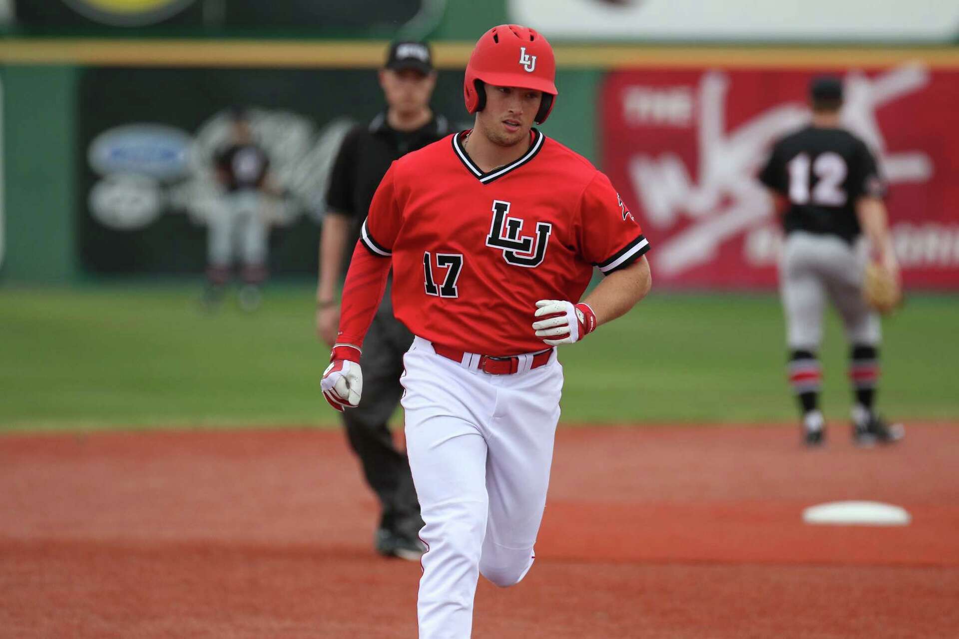 Gilligan draws comparison between Russell, famed MLB slugger