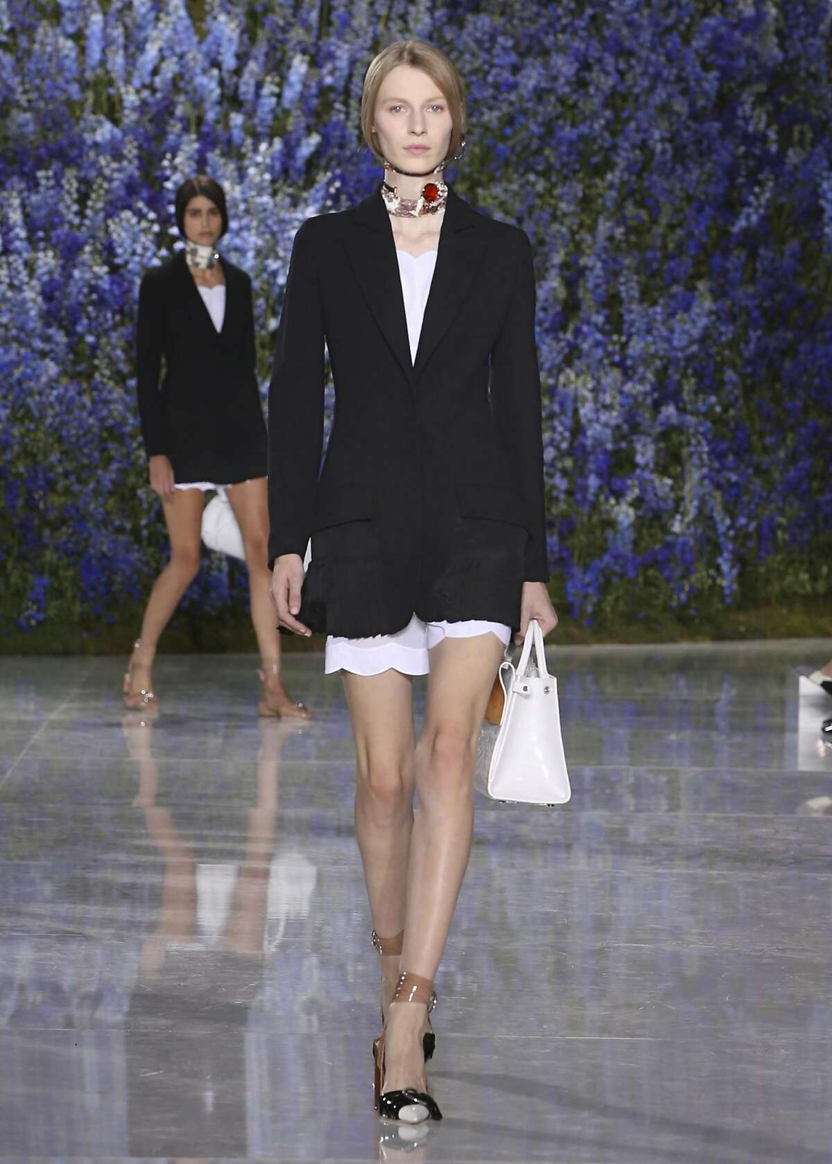 Dior waves French flag in SF