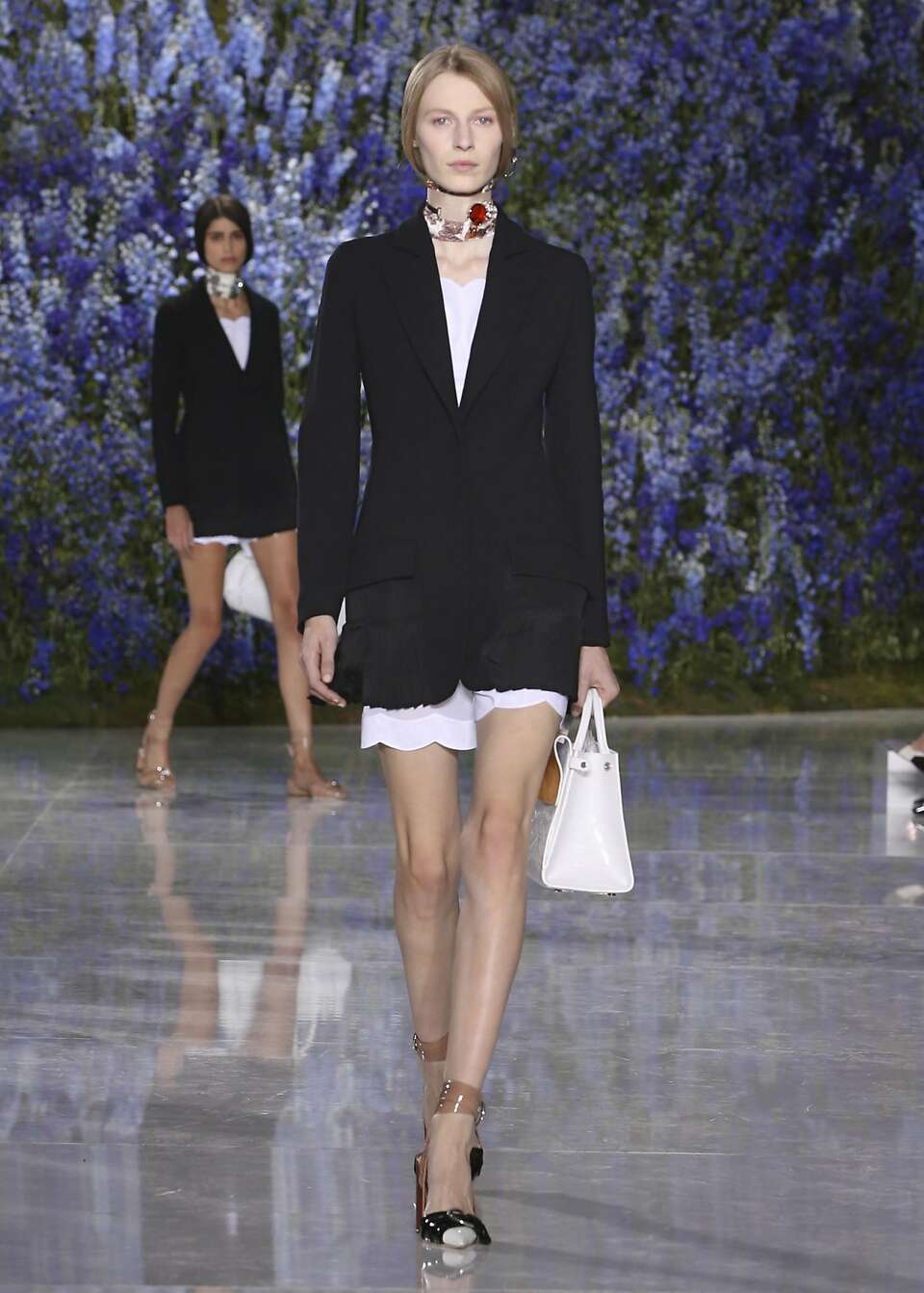 Dior waves French flag in SF