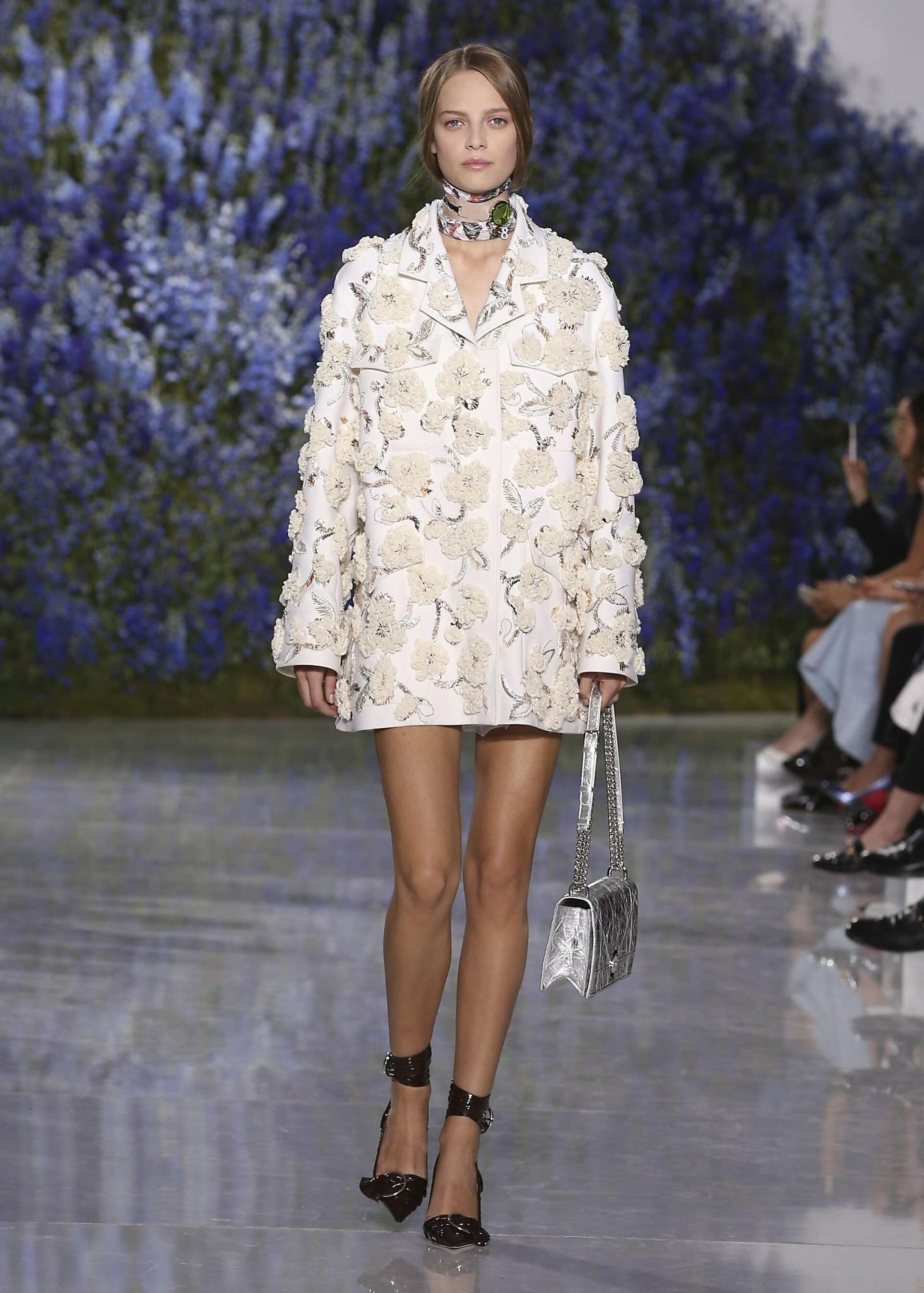 Dior waves French flag in SF