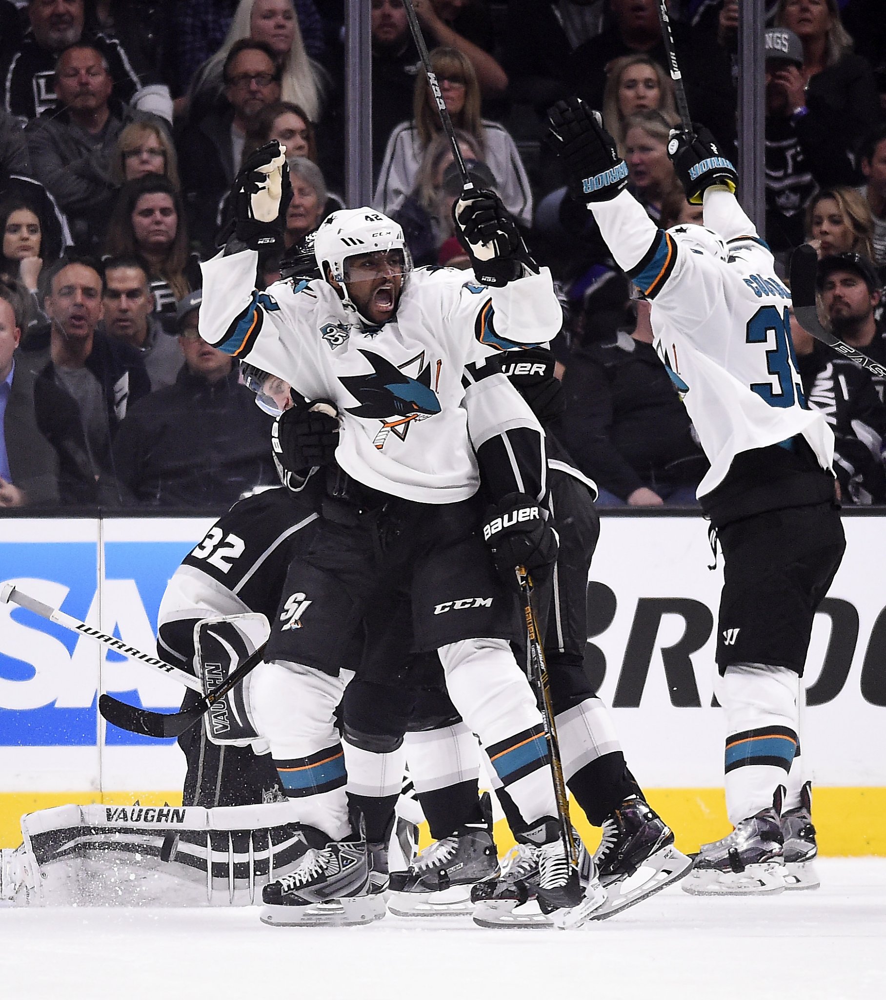 Sharks top Kings in playoff opener