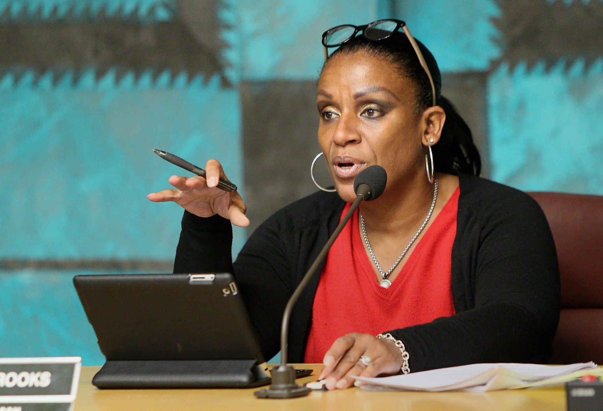 Activist sues over alleged punch from Oakland councilwoman