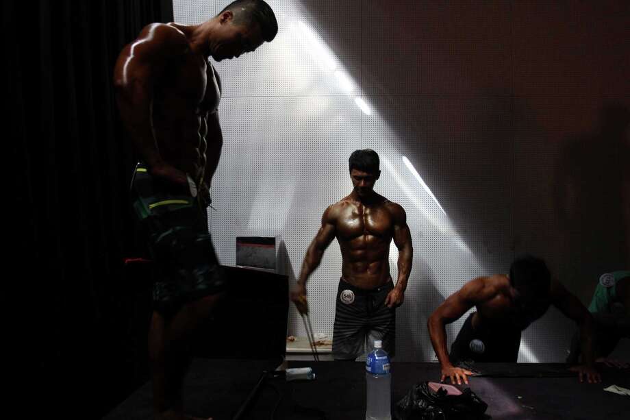 South Korean bodybuilders tone up for championships - seattlepi.com
