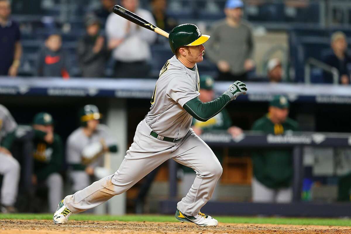 Mark Canha's RBI single gives A's win in 11th inning