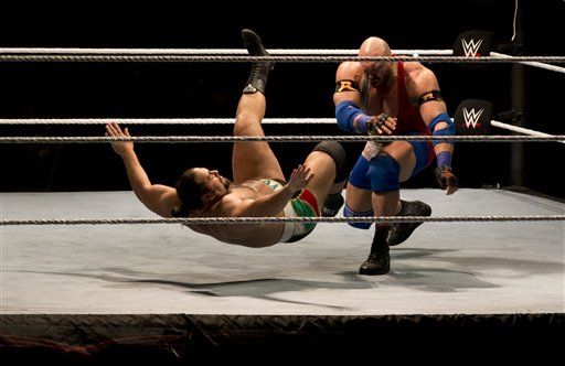 WWE stars hit pause on fights to preach anti-bullying effort