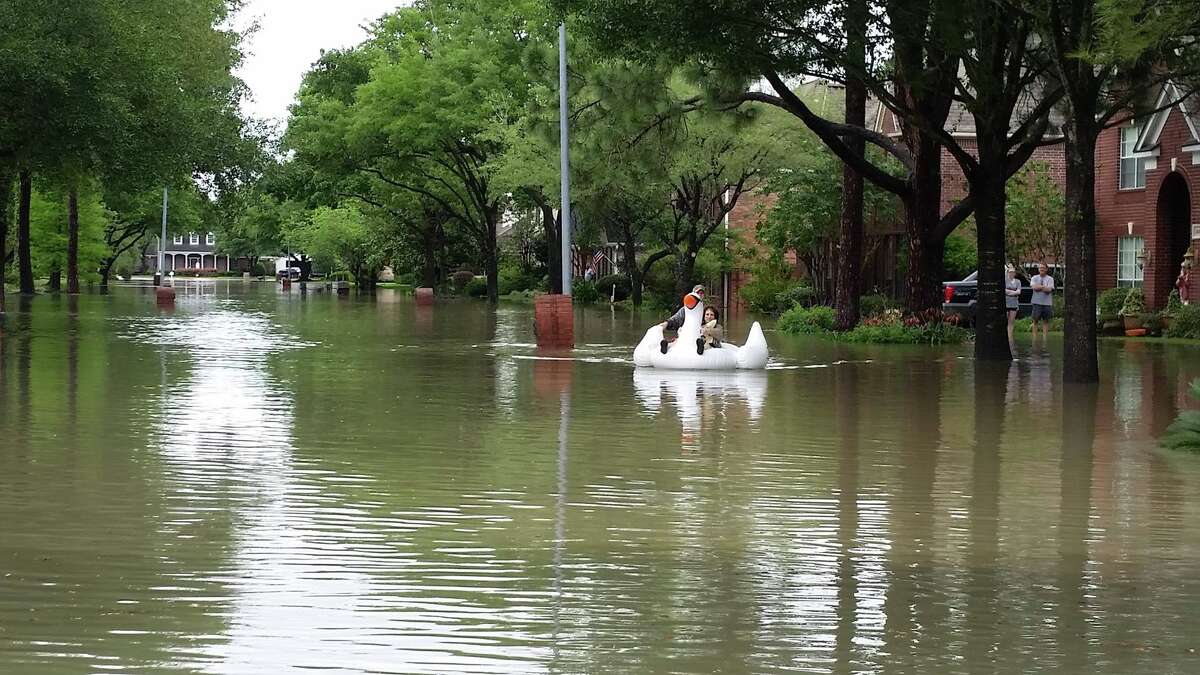 Katy midwife rides an inflatable white swan to help birth a baby