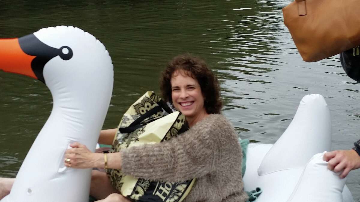Katy midwife rides an inflatable white swan to help birth a baby