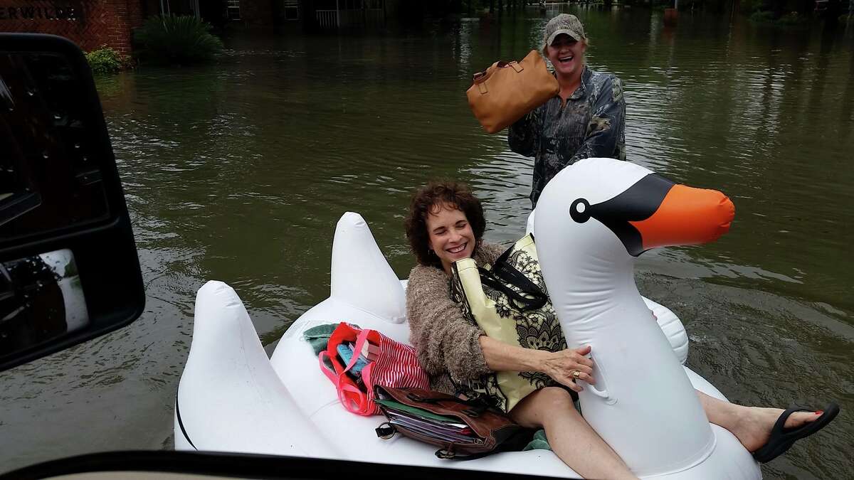 Katy midwife rides an inflatable white swan to help birth a baby